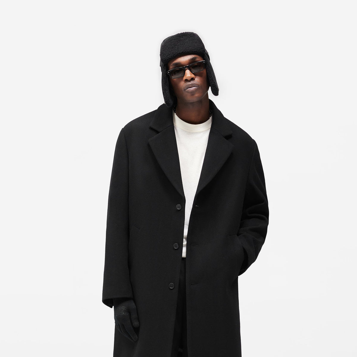 Jet Black Relaxed Overcoat | Coats & Outwear | REPRESENT